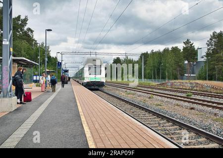 Intercity train arriving at the Kempele railway station, Finland Stock ...