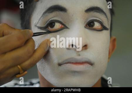Mime artists from a mime group,"Sur-Pancham", are getting ready for a ...
