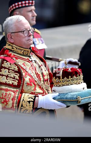 The Lord Lyon King of Arms, Joseph Morrow, arrives for a service to ...