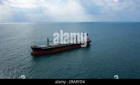 Self-unloading bulk carrier at Rio De La Plata anchorage. Aerial front ...