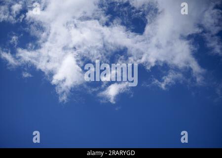 Stratus cumulus alto nimbo clouds in the blue sky are weather ...