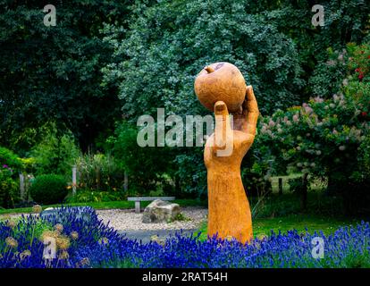 Wyndham Park, Grantham, Lincolnshire, UK. A wood hard carved sculpture ...