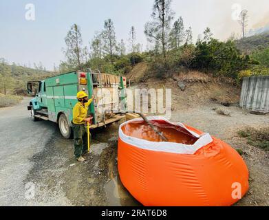 Every single foot of hose must be carried in & placed by hand to help ...