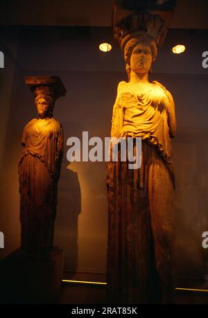 Statues and ancient artifacts at the Acropolis museum in Athens, Greece ...