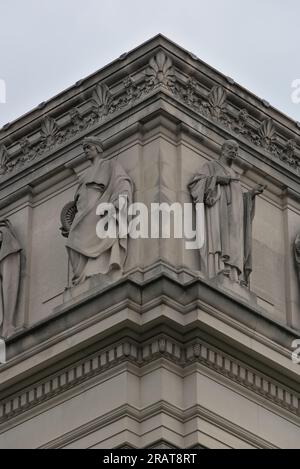 Multiple statues of historical and religious figures on the facade of ...