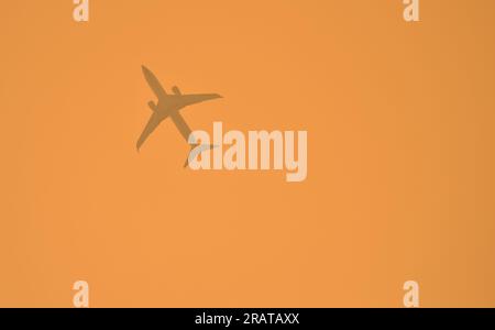 airplane flying in smoke filled sky, brooklyn, new york city (hazy ...