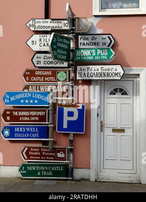 Very crowded sign post in Southern Ireland, Eire Stock Photo - Alamy