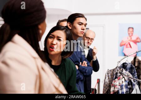 Mad angry people shoppers lined up early at store entrance attacking ...