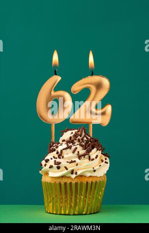 Vertical birthday card with number 62 candle - Green background with ...
