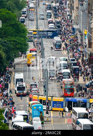 Heavy public transport traffic and pedestrians on Princes Street in ...