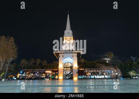 11 October 2022, Kemer, Turkey: Clock tower with Mokka cafe on a ...