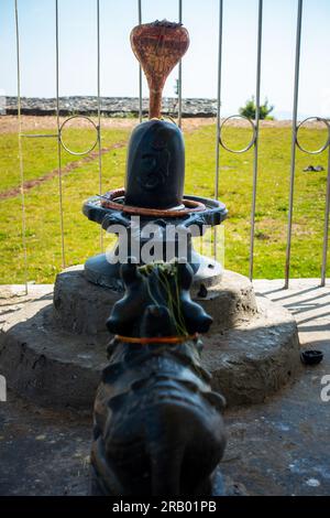 June 28th 2023,Nagthat, Uttarakhand, India.Black stone Shiva Linga, a ...