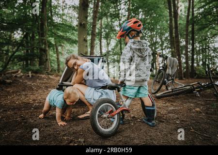 Little boy with running wheel Stock Photo - Alamy