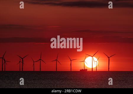 Sunset over the Burbo Bank offshore wind farm, Liverpool Bay, England ...