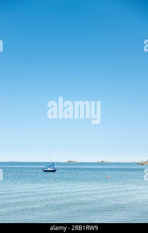 A large sailboat sailing on clear blue waters Stock Photo - Alamy