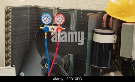 Close up of manifold gauges used for checking air conditioner ...