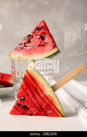 Sweet watermelon sticks on white background Stock Photo - Alamy