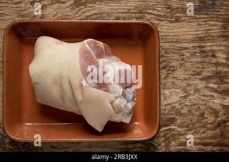 An uncooked British gammon shank that will be used to make a homemade ...