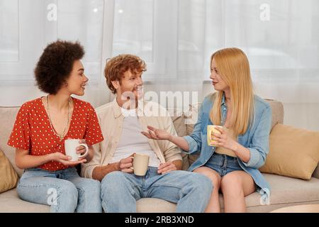 polyamorous family, love triangle, cheerful multicultural women and ...