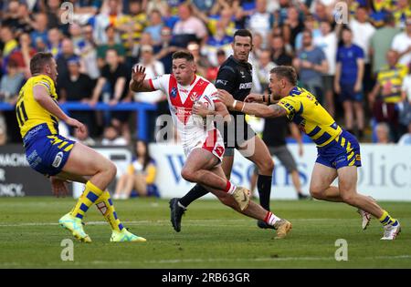 St Helens' Jack Welsby (centre) in action during the Betfred Super ...