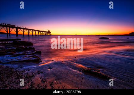 Historic Catherine Hill bay jetty at Middle Camp beach on Pacific coast ...