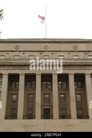 Views of the front of Main Interior Building, flag Stock Photo - Alamy