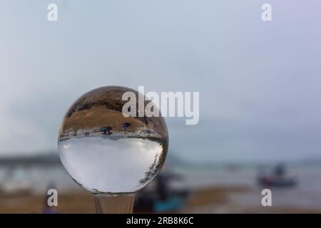 raining on crystal balls beside the beach. Nature image raining ...