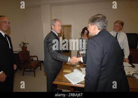 President George W. Bush touring offices in Main Interior, meeting ...