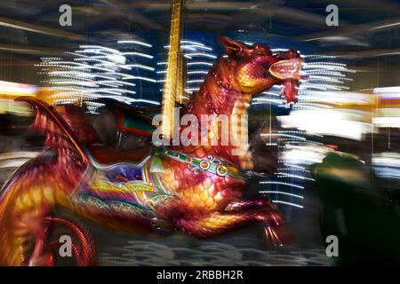 merry go round action shot Stock Photo - Alamy