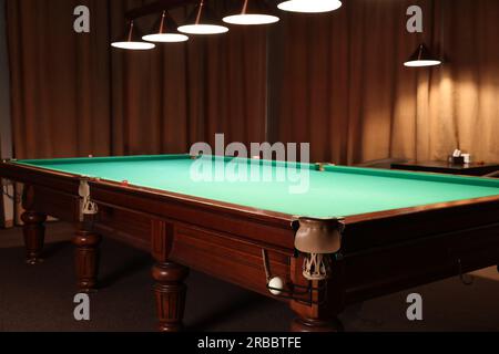 Empty green billiard table in club. Pool Game Stock Photo - Alamy
