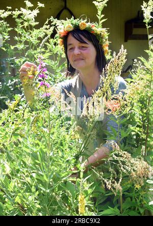 PRODUCTION - 28 June 2023, Saxony, Falkenhain: Known as the herb witch ...