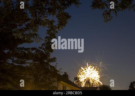 Fireworks Seen Over Houses in a Neighborhood Stock Photo - Alamy