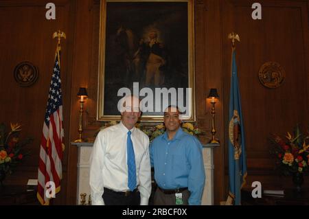 Secretary Dirk Kempthorne with Interior staffer Edwin Candelario at ...