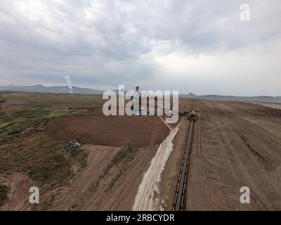 huge bucket wheel excavator digging operations in the brown coal mine ...
