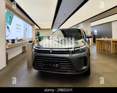 Seres Aito M5 and M7 EV cars displayed at Huawei retail store in ...