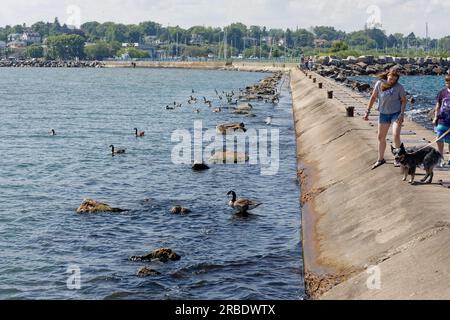 Manitowoc WI USA July 08 2023 : the breakwater forms the path to the ...