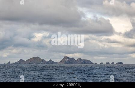 Cruising Cape Horn on rough sea. Cape Horn is rocky point on Hornos ...
