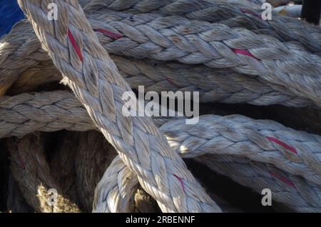 Rolled-up rope on board a sailing vessel Stock Photo - Alamy