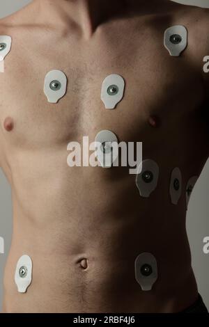 young boy's chest with electrocardiogram hickeys Stock Photo - Alamy