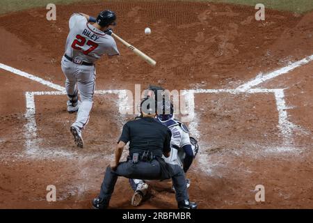 Atlanta Braves' Austin Riley hits a single in the sixth inning of a ...
