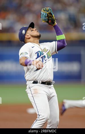 Atlanta Braves' Ozzie Albies catches a ball with Ron Washington, during ...