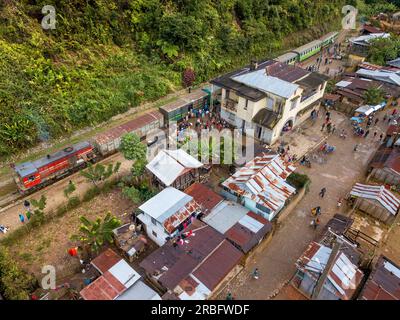 Aerial view Tolongoina station. Old train on the railway line from ...