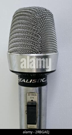 Stainless Steele vintage microphone with cord Stock Photo - Alamy