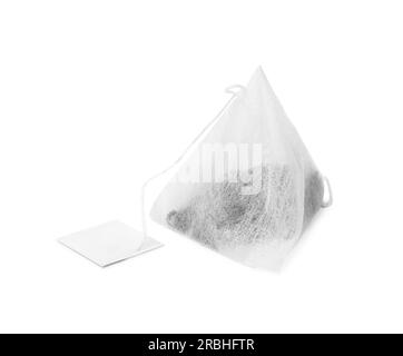 One new tea bag with label on white background Stock Photo - Alamy