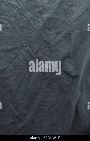 Crumpled gray fabric. Bed in the morning. The spread out bed. Linens ...