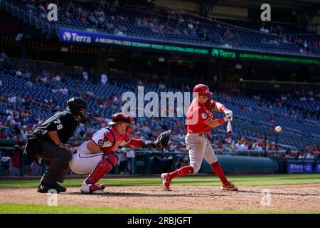 Cincinnati Reds' Matt McLain swings during an at-bat in front of ...