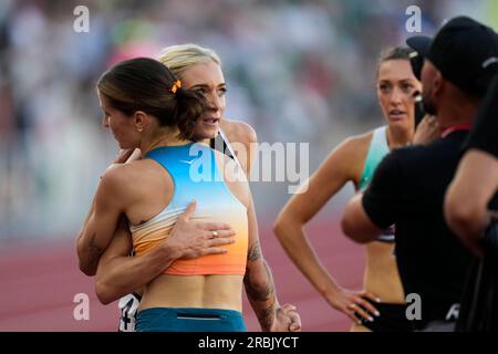 Second place finisher Emma Coburn walks on the track after the women's ...