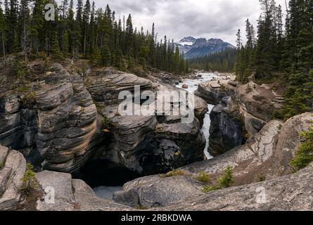 The Mistaya River flows through Mistaya Canyon in Banff National Park ...