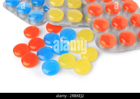 Many colorful cough drops on white background Stock Photo - Alamy