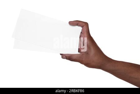 African American man holding flyers on white background, closeup ...